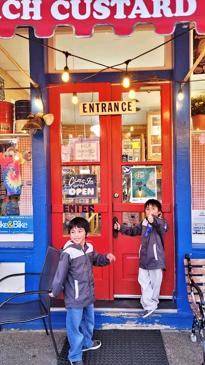 The iconic red doors welcome excited young visitors, promising sweet memories that will last far longer than the treats.