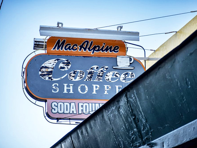 That sign isn't retro-inspired, it's actually retro, having guided hungry Phoenicians to happiness through decades of desert heat.