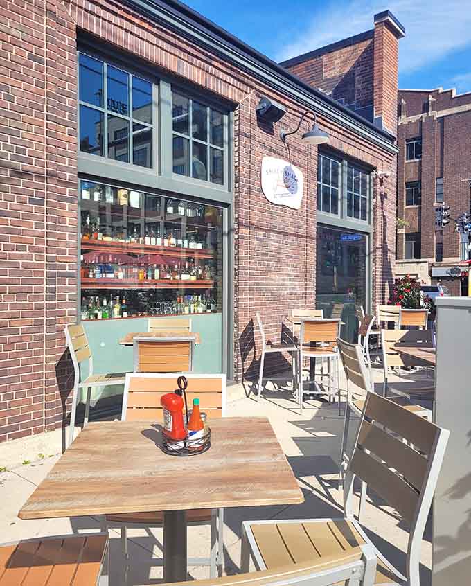 The outdoor patio transforms into prime real estate during warmer months, where people-watching and lobster-eating become equally important activities.