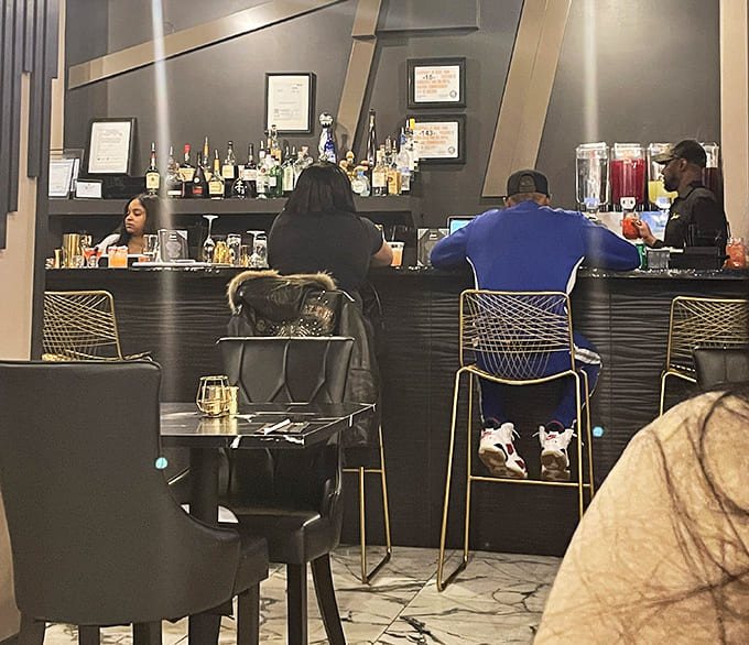 The buzz of happy diners and attentive staff creating the kind of energy that makes restaurants memorable.