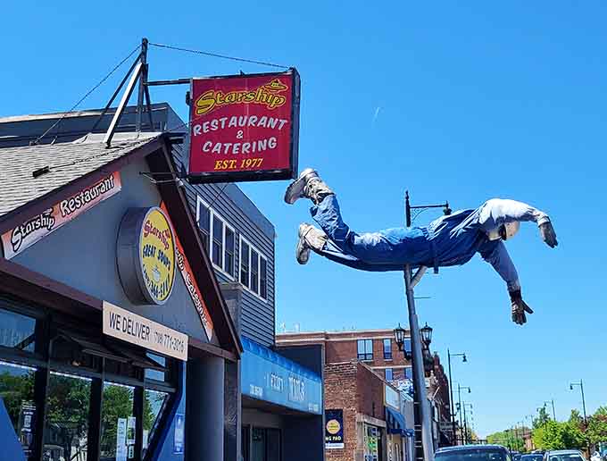 That red sign has been guiding hungry travelers to sandwich paradise, becoming a beloved landmark in its own right.