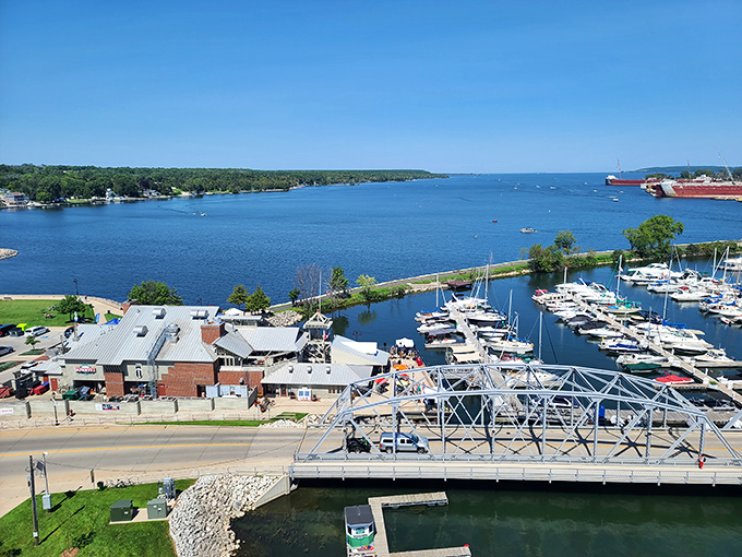 Harbor view showcasing boats, buildings, and blue waters &ndash; the trinity of waterfront perfection that makes landlocked visitors reconsider their life choices.