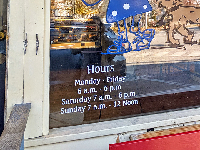 Hours posted on the window &ndash; also known as "times when happiness is available for purchase" to locals in the know.