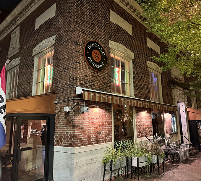 Street Frontage: As dusk falls, Pascolo's warm glow transforms Church Street into a scene worthy of a romantic comedy's pivotal moment.