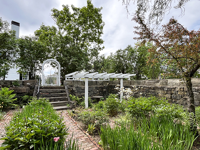 The meticulously maintained Sunken Garden offers a peaceful retreat &ndash; where stone walls and thoughtful plantings create a secret oasis in the heart of town.