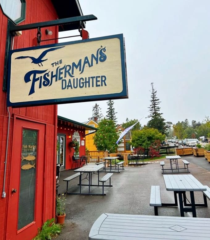 Outdoor seating with harbor views transforms a simple meal into a waterfront dining experience that's worth every mile of the drive.