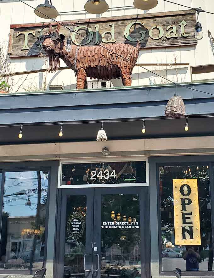 The entrance beckons with that illuminated "OPEN" sign, your gateway to the best jambalaya in Michigan.