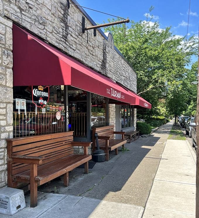 Outdoor benches invite you to enjoy your meal in the fresh air, perfect for people-watching in this charming historic neighborhood.