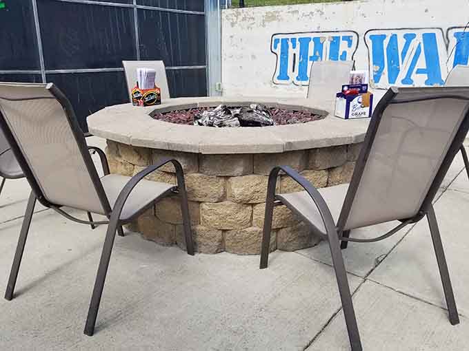 The outdoor fire pit provides a gathering spot for cooler evenings when conversation flows as freely as the drinks.