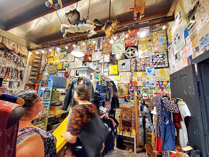 Board games become wall art in this colorful corner where shoppers discover the thrill of finding pieces of their past amid vintage treasures.