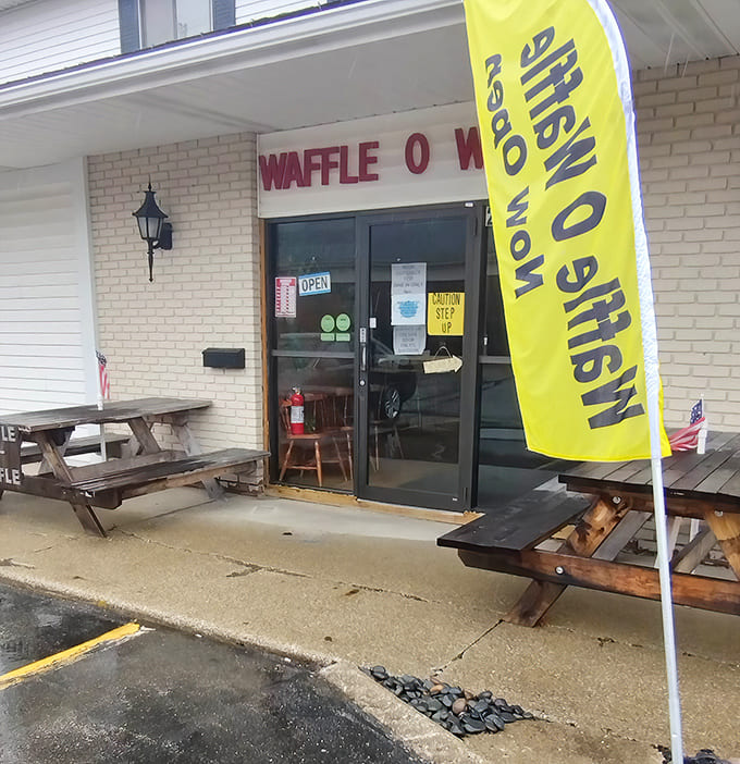 That yellow flag announces they're open for business, like a delicious beacon guiding hungry travelers to their waffle destiny.