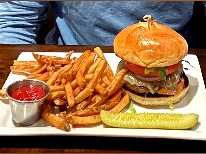 The aristocrat of burgers &ndash; thick, juicy, and accompanied by golden fries that look like they were individually selected for greatness.