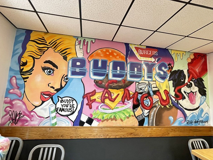 The vibrant wall mural captures Buddy's playful spirit, featuring cartoon characters celebrating the establishment's well-earned famous status.