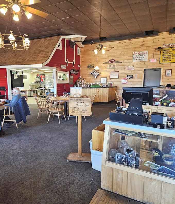 The barn-inspired interior design with its red accents and wooden details creates an atmosphere that feels authentically rural without being kitschy or forced.