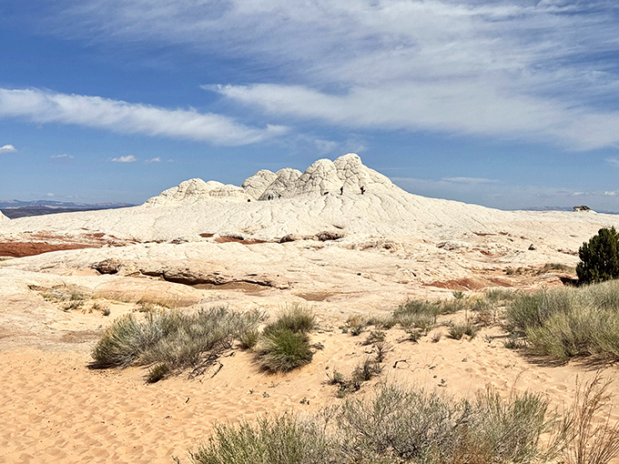 White sandstone formations rising like meringue peaks, geological confections that took millions of years to perfect.