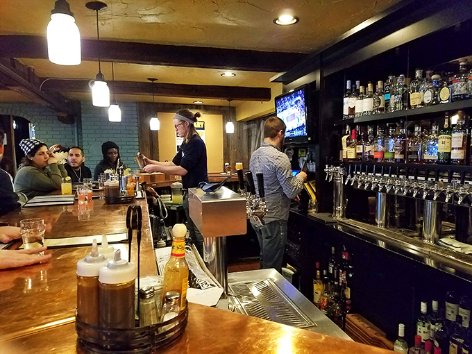 The well-stocked bar promises liquid companions worthy of the smoky treasures emerging from the kitchen beyond.