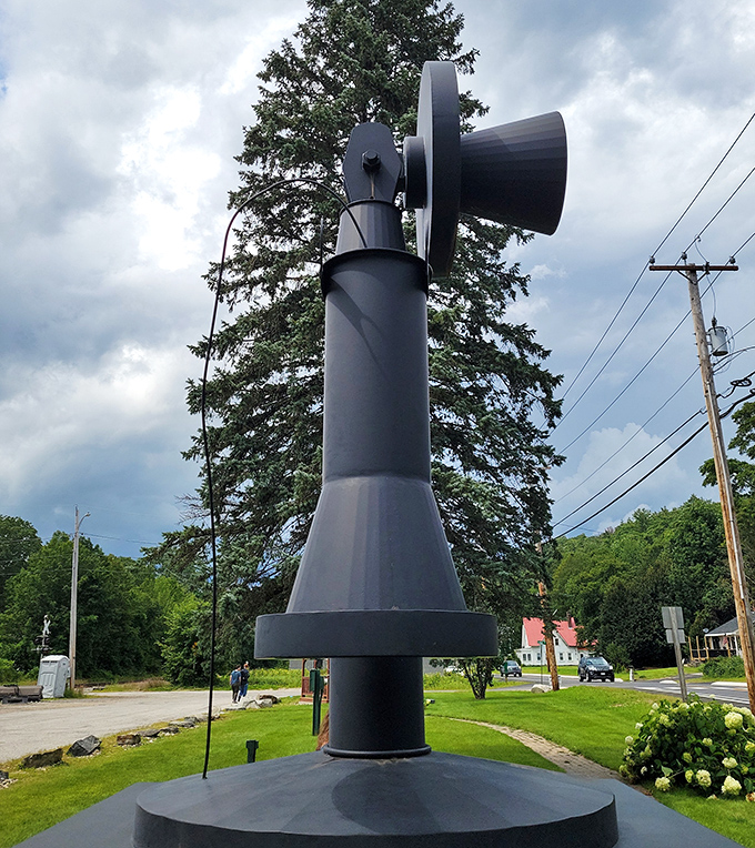 This close-up reveals the careful attention to detail in recreating the iconic shape of vintage telephone equipment on a massive scale.