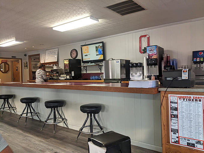 The counter service area combines efficiency with small-town charm &ndash; where your coffee cup won't stay empty for long.