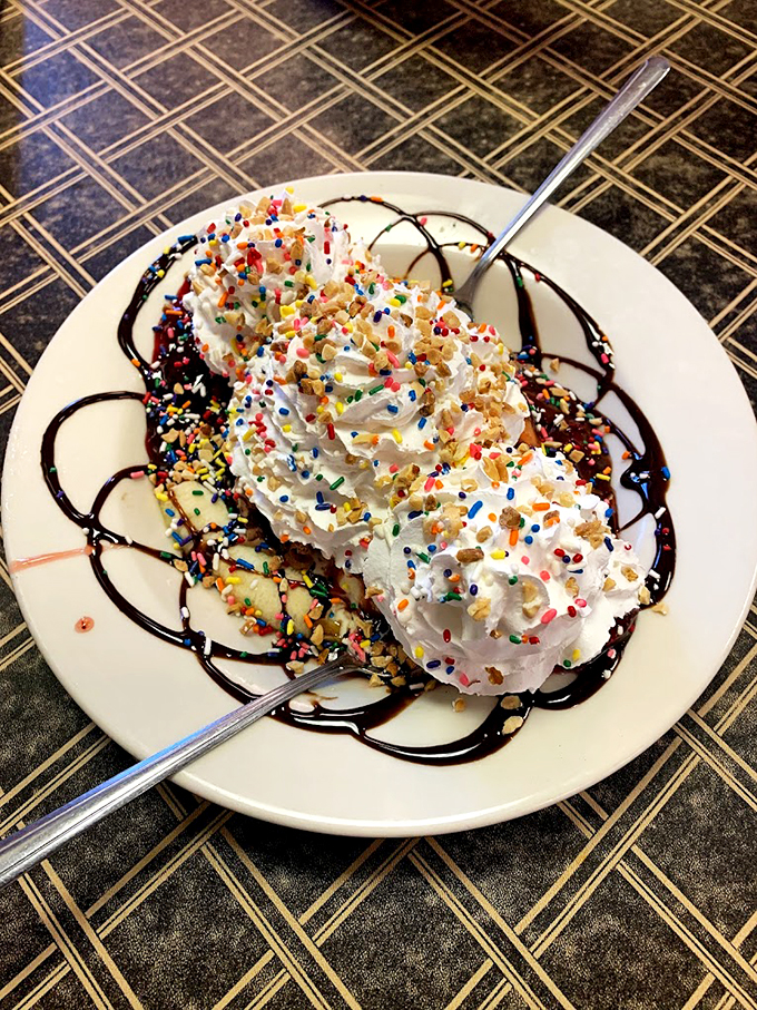 A sweet explosion that's more colorful than a Pixar movie! This dessert is what happens when sprinkles throw a party on your plate.
