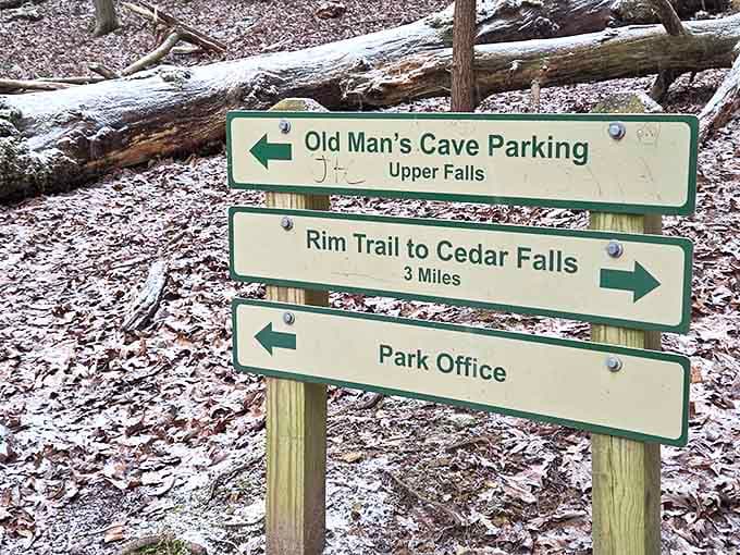 Trail markers point the way to adventure, each direction promising its own unique encounter with Hocking Hills' wonders.