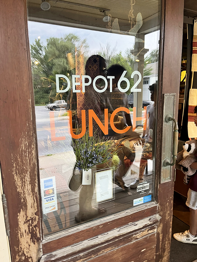 "LUNCH" announces itself boldly through weathered glass, a simple invitation to one of Vermont's most unexpected culinary journeys.