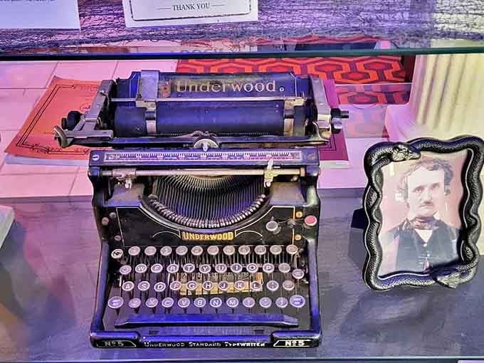 Edgar Allan Poe watches over this vintage Underwood typewriter, honoring horror's literary roots before it leaped to the silver screen.