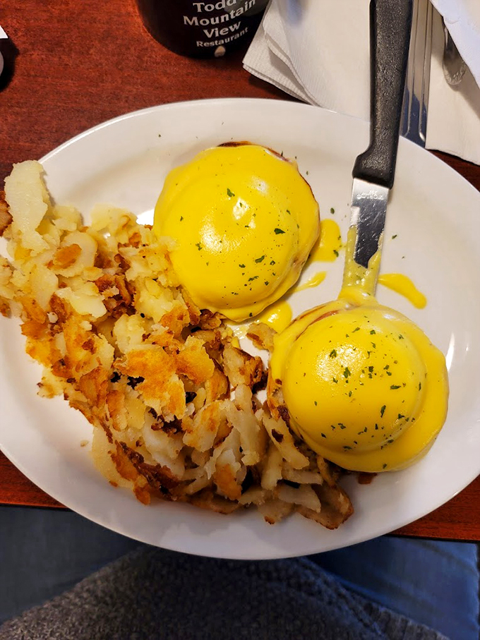 Eggs Benedict: where elegance meets down-home cooking. It's the ballgown of breakfast, with a side of country charm.