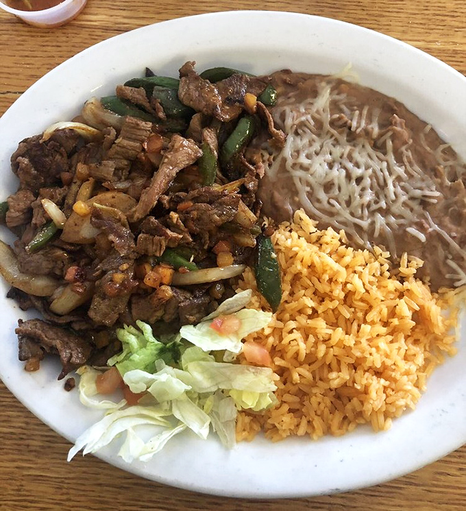 Sizzling fajitas arrive with tender meat, colorful vegetables, and that unmistakable aroma that turns heads throughout the restaurant.