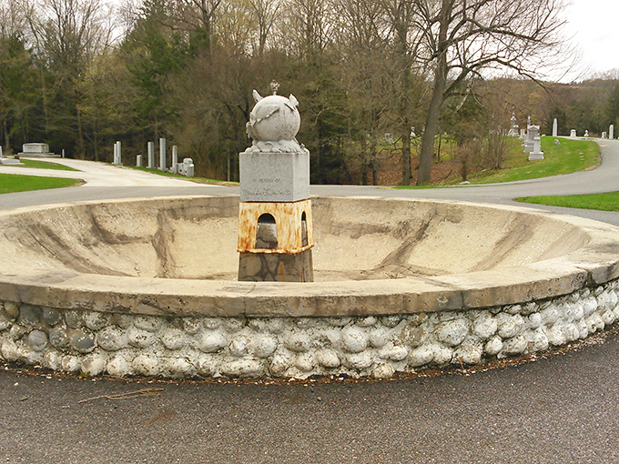 Even the cemetery's fountain features whimsical touches, proving that Barre's stone artisans found joy in every project.