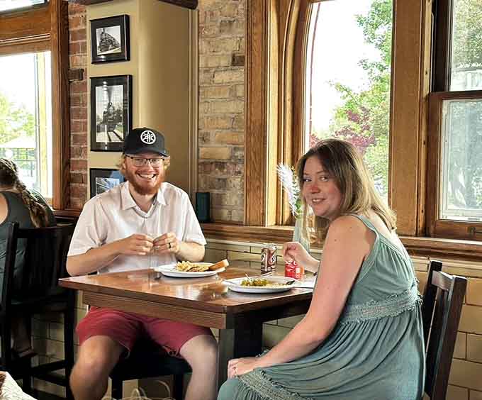 Happy diners enjoy their meals in a space where the food is good and the mission is even better, creating smiles that have nothing to do with posing for cameras.