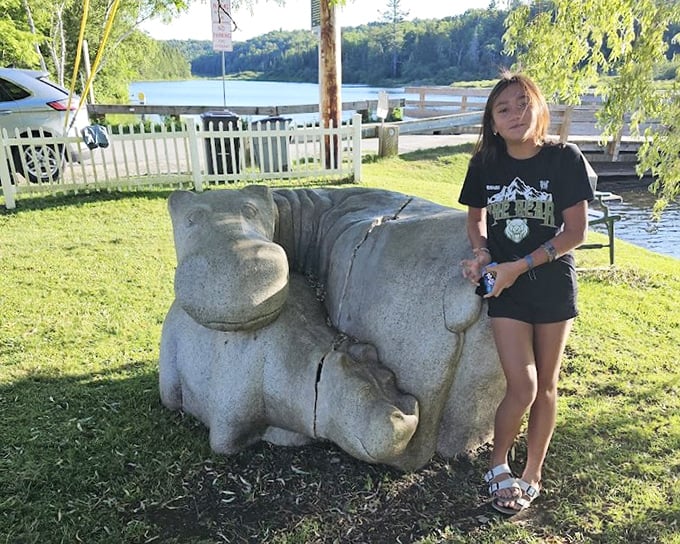 A whimsical hippo sculpture guards the approach to the Floating Bridge, offering a playful welcome to visitors of all ages.