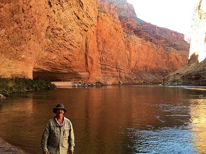 Indiana Jones would approve! This river explorer stands at the threshold of discovery, where every bend reveals another geological wonder.
