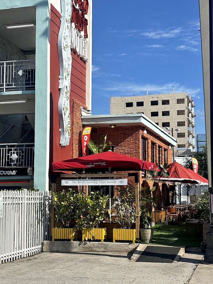 Sunshine and good times await under the St. Petersburg sky, where Mad Radio's exterior beckons food lovers with promises of culinary delights.