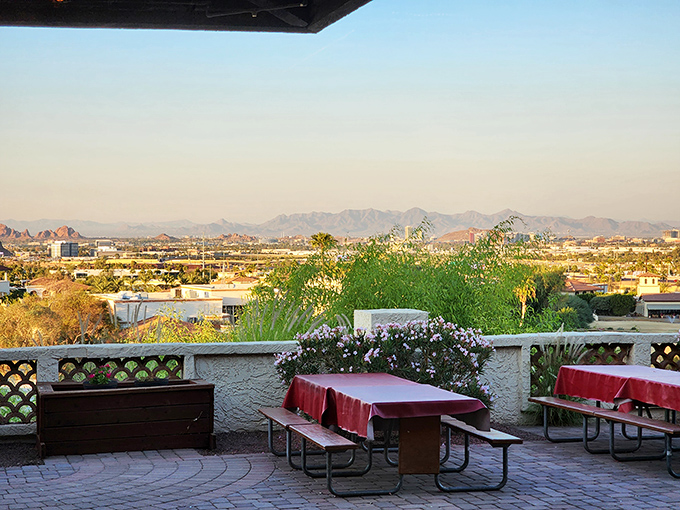 The outdoor patio offers breathtaking panoramic views of Phoenix – especially magical at sunset when the valley lights begin to twinkle below.
