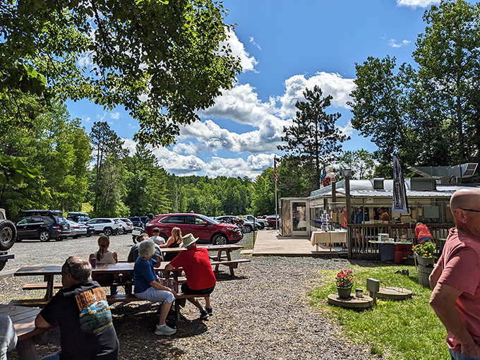 Summer dining al fresco &ndash; where picnic tables and pine trees enhance the flavor of every bite.