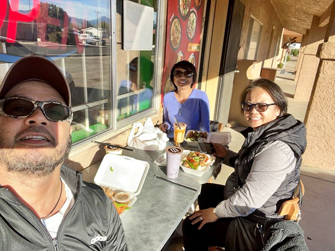 Al fresco dining, Arizona-style. Simple outdoor seating offers the perfect spot to enjoy crispy pork belly while soaking up the desert sunshine.