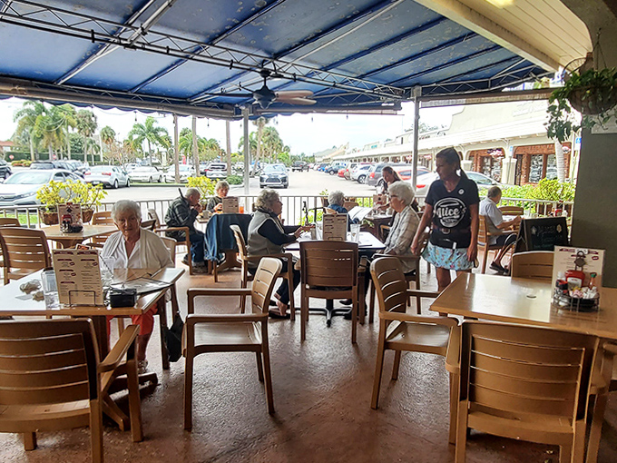 Outdoor dining at Alice's lets you enjoy Florida's perfect weather while diving into breakfast classics with a side of people-watching.