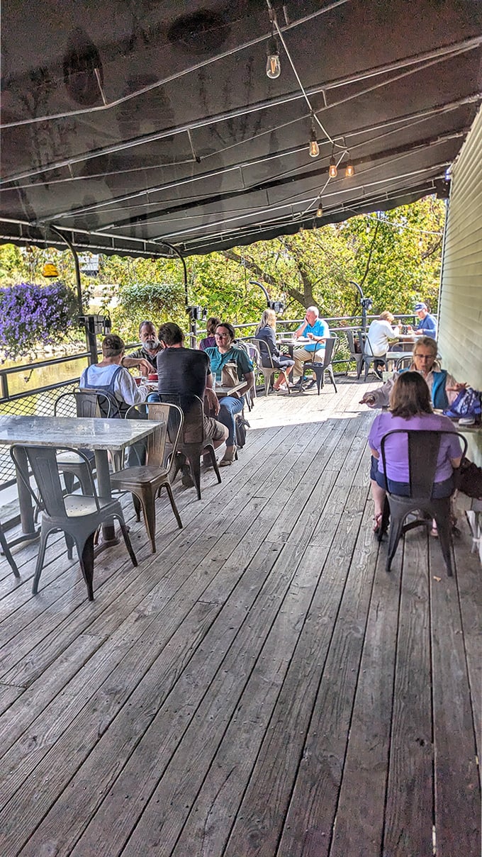 The wooden deck becomes Vermont's most delicious living room, where strangers become friends united by the universal language of good food.