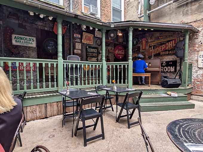 The outdoor courtyard offers an urban escape where string lights and brick walls make you forget you're in downtown Cincinnati.
