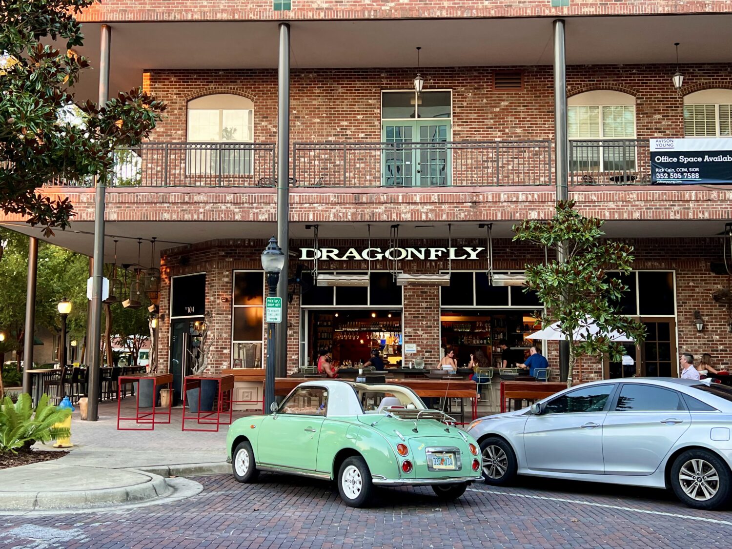 Dragonfly's illuminated storefront glows like a lantern against Gainesville's brick architecture – a beacon for hungry souls seeking sushi salvation.