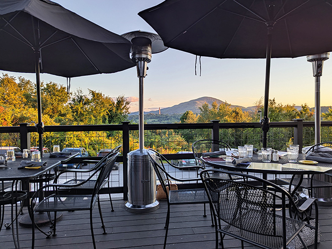The outdoor deck offers panoramic mountain views that change with the seasons but never disappoint.
