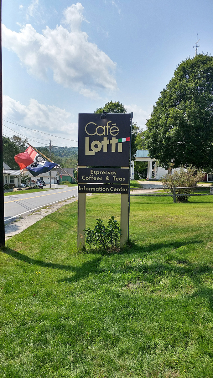The Caf&eacute; Lotti sign stands as a beacon for hungry travelers and locals alike, promising exceptional coffee and those waffles everyone keeps talking about.