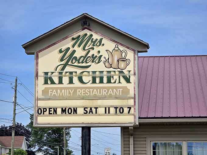 The roadside sign announces what locals already know: this is where you come for authentic Amish cooking done right.