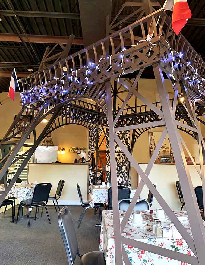 The architectural marvel of the dining room's Eiffel Tower creates an unforgettable setting for enjoying authentic French cuisine.