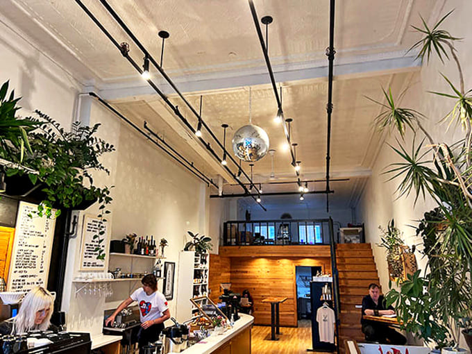 Staff: The airy, plant-filled space with high ceilings and natural light creates the perfect stage for breakfast theater to unfold.