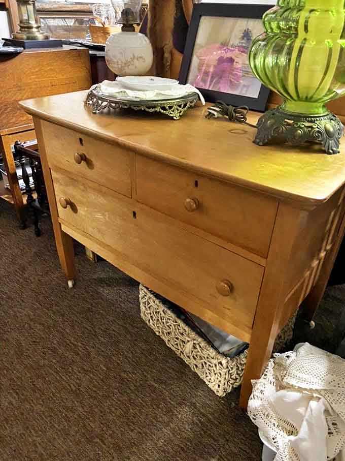 Solid maple construction and dovetail joints make this vintage dresser a testament to craftsmanship that's increasingly rare in today's furniture landscape.