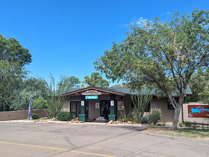 The visitor center welcomes explorers with rustic charm, a gateway to adventures waiting in the natural area beyond.
