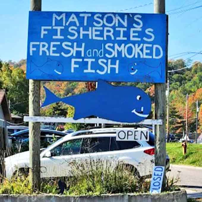 Matson's Fisheries sign stands as a beacon to hungry travelers &ndash; "Fresh and Smoked Fish" isn't just advertising, it's a solemn promise.