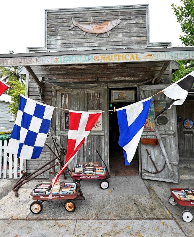Little red wagons filled with literary treasures stand ready outside this weathered wooden time machine &ndash; Florida's most charming invitation to slow down and browse.