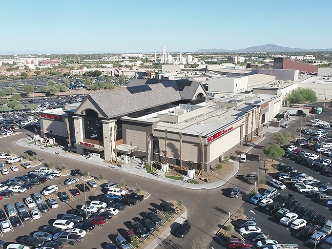 This aerial view reveals Scheels' impressive footprint, a retail oasis drawing shoppers from across the Valley of the Sun.